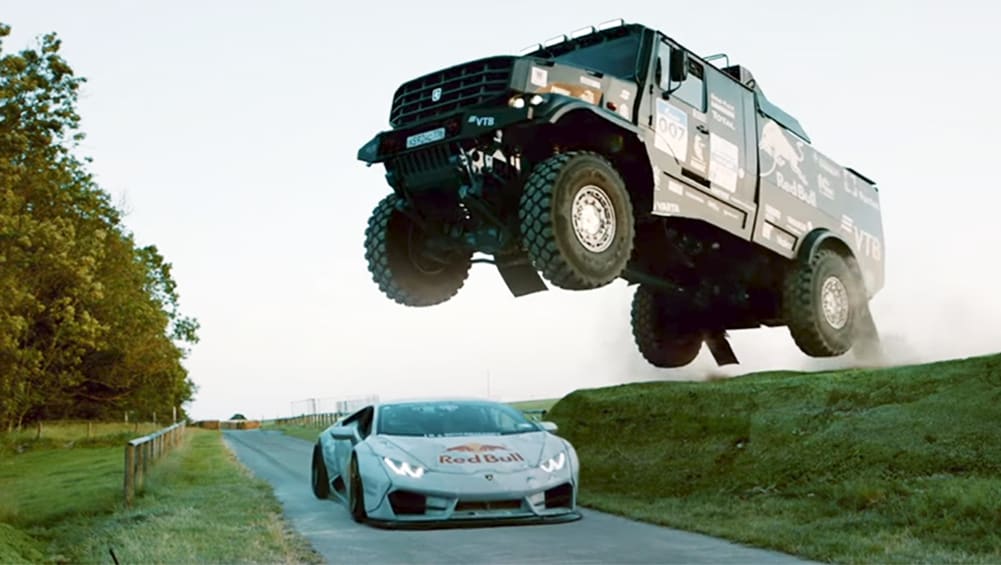 Drift Lamborghini takes on Dakar race truck in world's most insane race ...