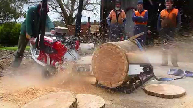 Holden V8 chainsaw is an Aussie muscle axe | video - Car News | CarsGuide