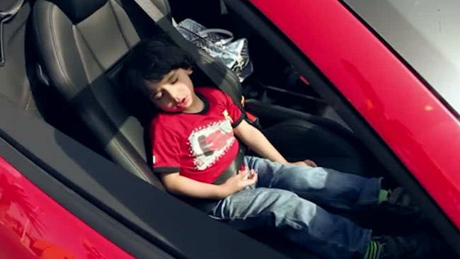 Dad buys Ferrari to help child sleep | CarsGuide