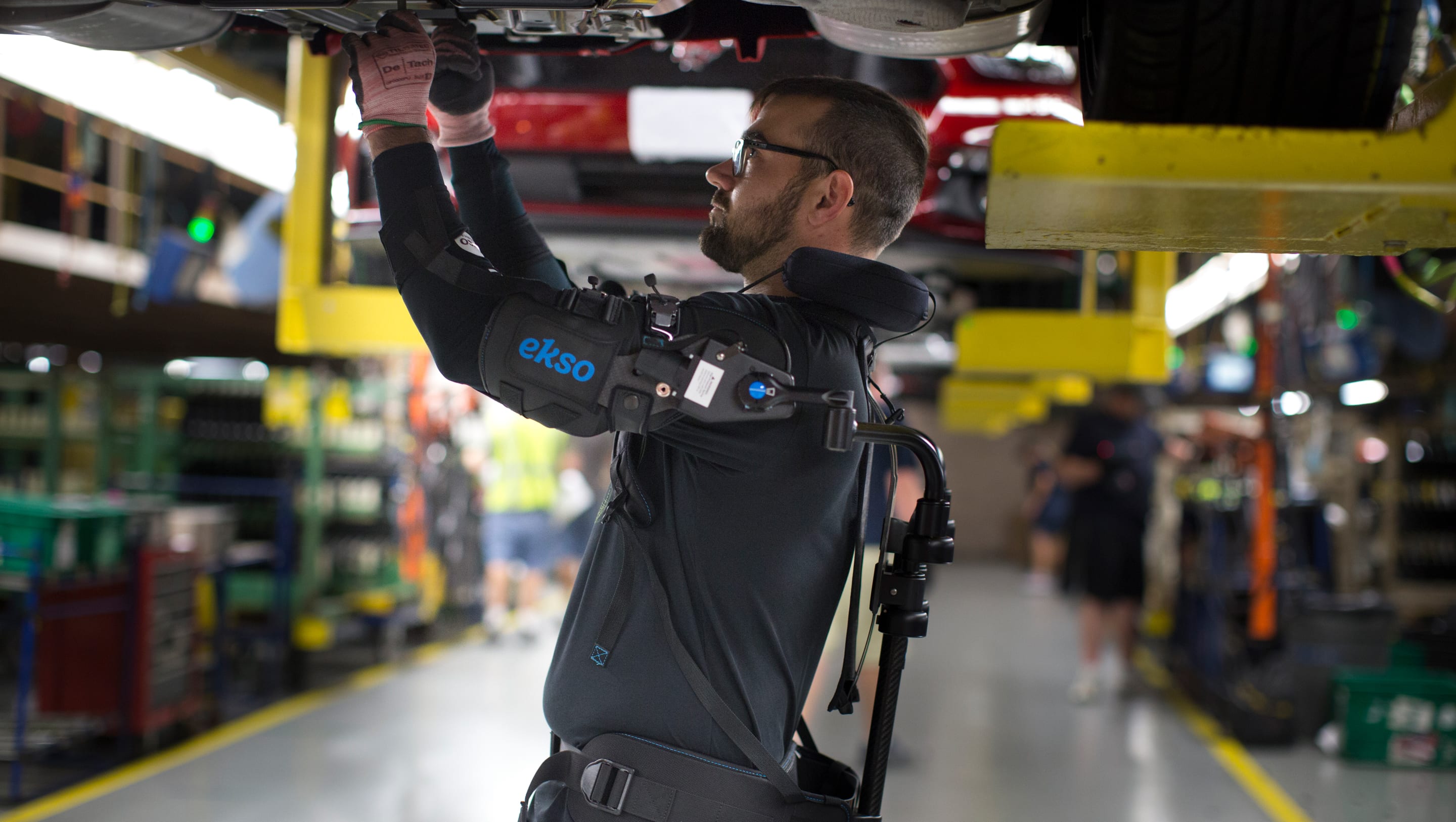 Ford equips factory workers with exosuits - Car News | CarsGuide
