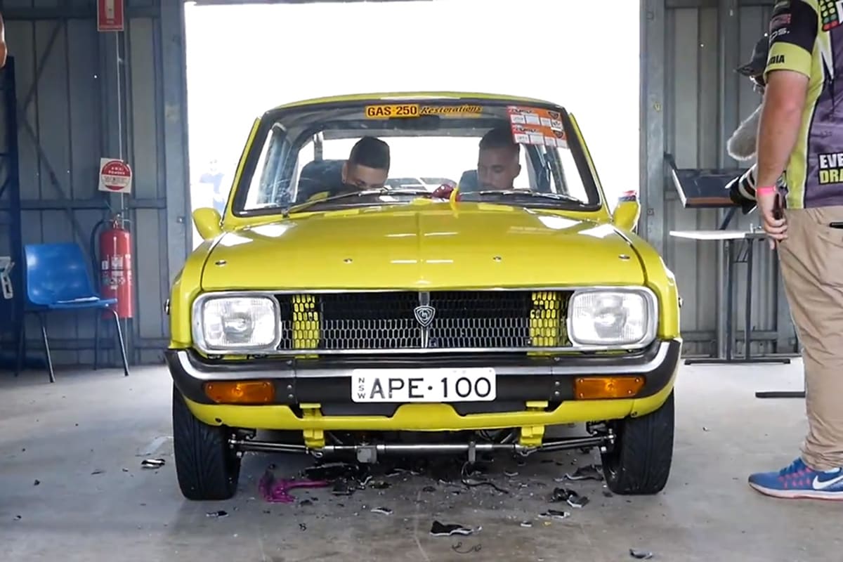 Watch this Mazda 1300 rotary's flywheel grenade through its bonnet ...