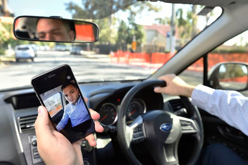 New mobile phone detection cameras bust thousands of drivers on debut ...