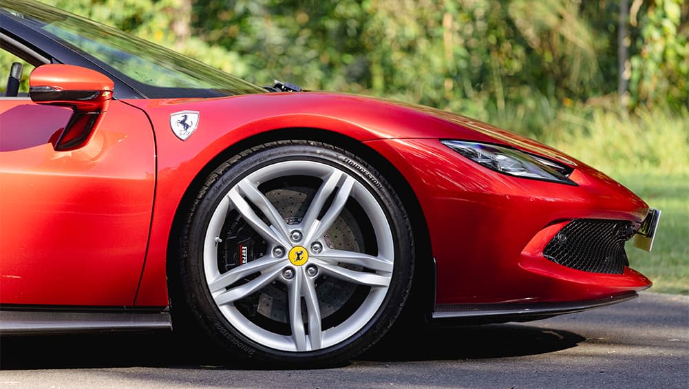 Ferrari's first electric car is a hatchback? Launch date for ...